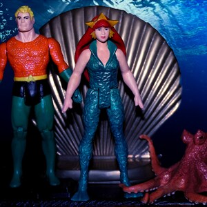 Batcave Trophy Room With Robin Memorial, Giant Penny, Penguin, and ...