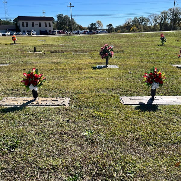 This Jumbo Cemetery Cone Pair Has Grave Flowers Including Red Roses ...