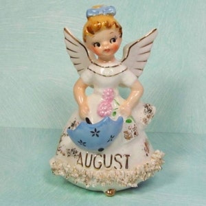 Fine A Quality Japan Vintage HTF Angel Boy Figurine Riding on Ski's ...