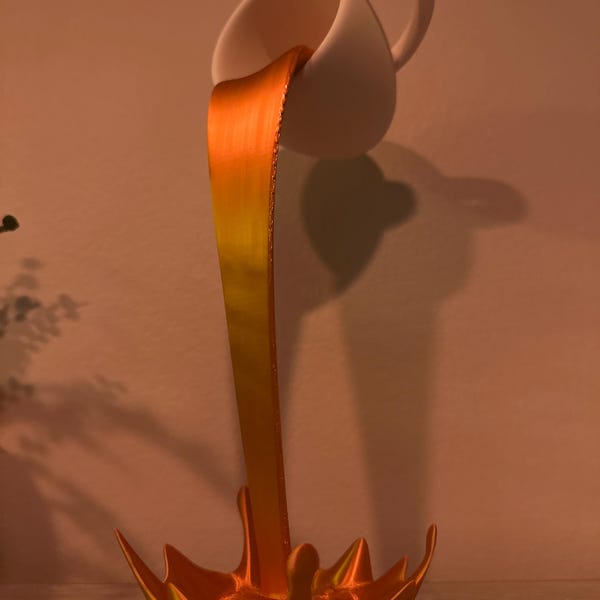 Gravity-defying Liquid Sculpture, Frozen in Time, a Cup Pouring Liquid ...