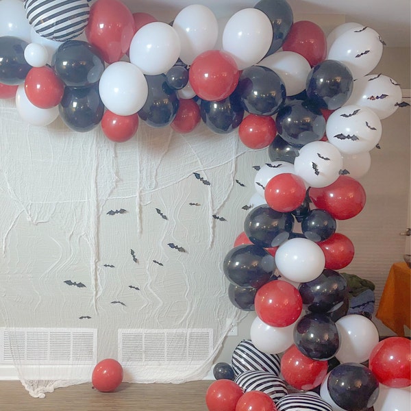 DIY Black and White Striped Balloon Arch | Black and White Balloon ...