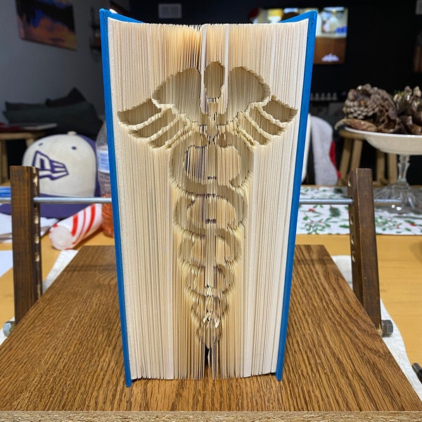 Medicine Symbol: Book Folding Pattern, Instruction DIY Folded Book Art ...