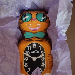 Pink & Purple Smiling Kit Cat Clock - Etsy