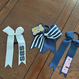 Custom College Cheer Bows Designed in Your Team Colors. Writing on ...