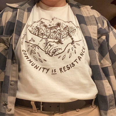 Community is Resistance T Shirt - Etsy
