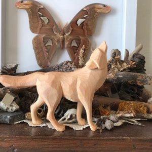 Hand Carved Lying Down Wolf | Etsy