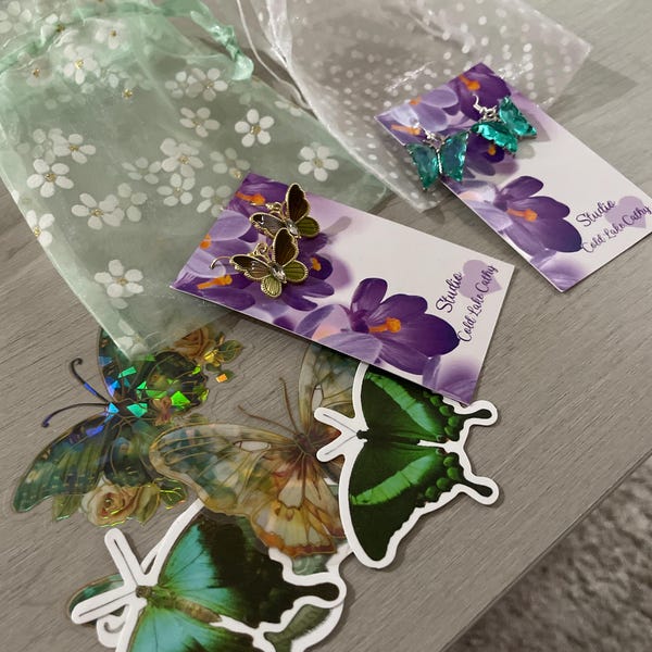 Scary Skull Earrings, Menacing Skeleton Head With Brilliant Red Rose in ...