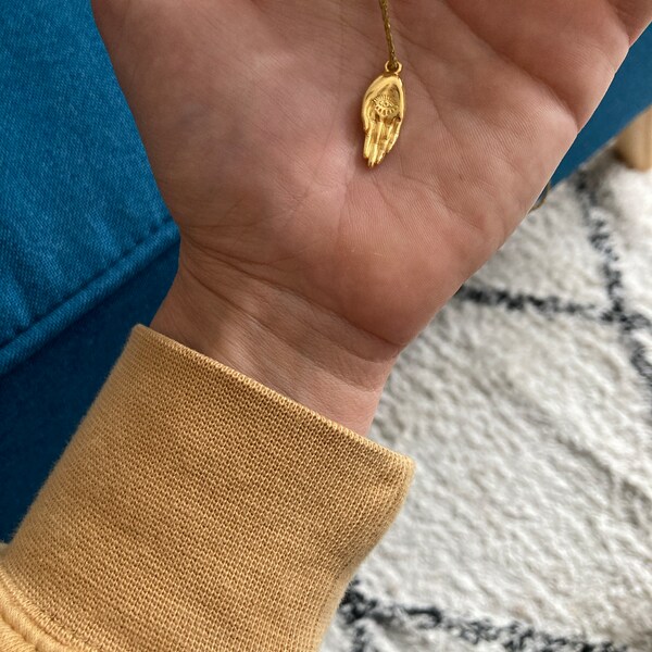 Talisman..amulette..grigri..main porte-bonheur oeil de chance ...