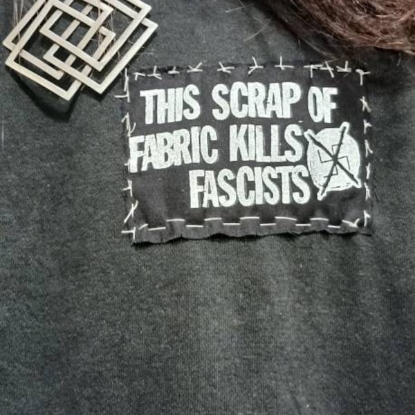 SNAKE WITCH PATCH Whoa She's Kneeling by the Lakeside and Her Arm is ...