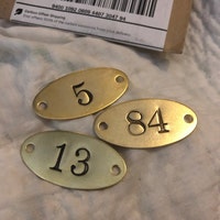 Hand Punched Brass Oval Numbered Tags Custom Numbered Locker Tags Oval ...
