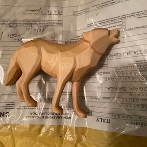 Hand Carved Lying Down Wolf | Etsy