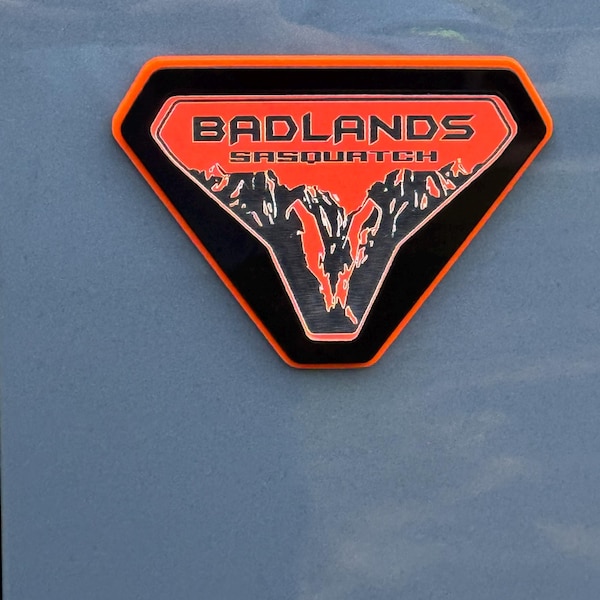 Badlands Sasquatch Orange on Black on Orange, Fender Badges, Acrylic ...