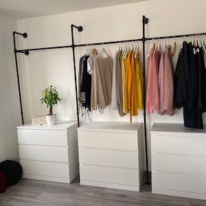 Hanging Coat Rail From Pamo. Designs Black Clothes Rail Made of Steel ...