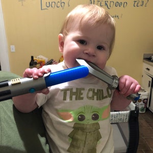 Darth Vader's lightsaber rattle | Etsy