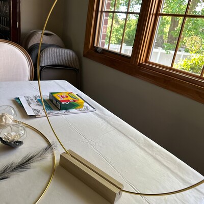 Hoop Centerpiece With Tiered Platform Stand. Metal Hoop Attached to a 3 ...
