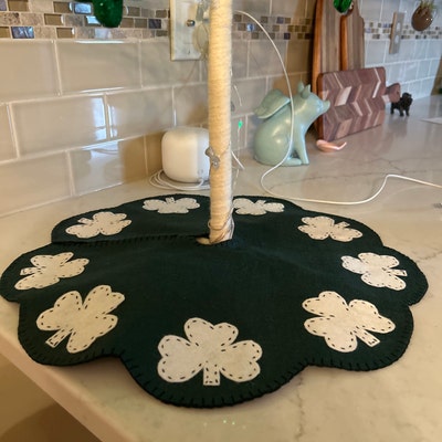 Feather Tree Candle Mat Shown on an off White Background Measuring 12 ...