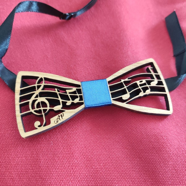 Music Wood Bow Tie, Musical Notes and Treble Clef on a Wooden Partition ...