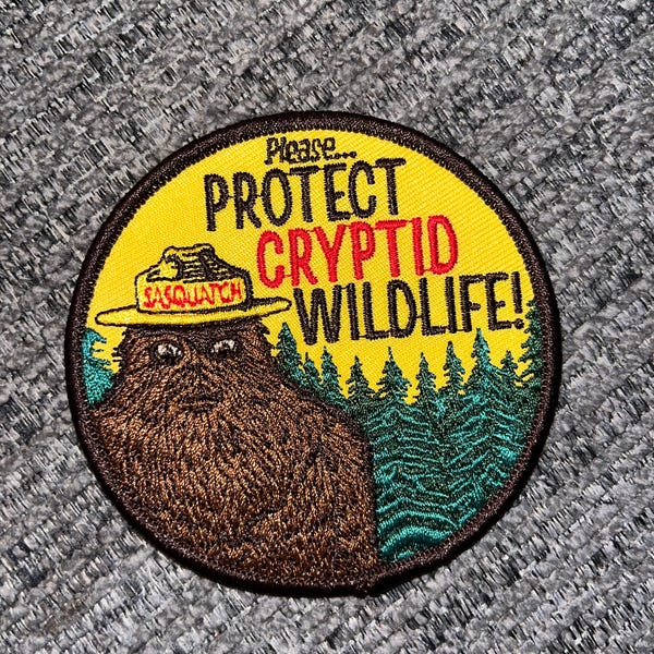 Cryptid PSA Patch - Cryptozoology Tracking Society Bigfoot Sasquatch Badge NPS Smokey the Bear ...