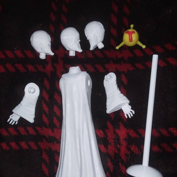 Batcave Trophy Room With Robin Memorial, Giant Penny, Penguin, and ...