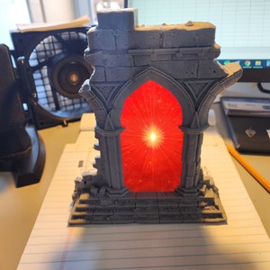 The Ruined Archway Phone Portal with A Cutout for a Charging Cable for ...