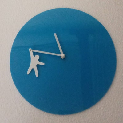 Fuchsia Hanging Man Wall Clock - Etsy