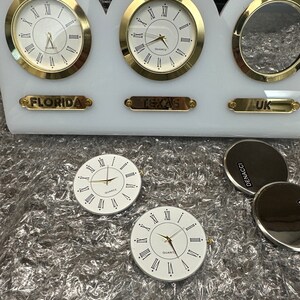 Time Zone Clock. 4 Customizable Zones. Optional Zone Labels. Personal ...