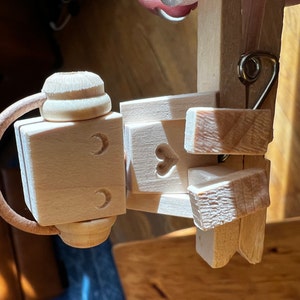 Tiny Robot Clothespin Automaton Flying a Kite it Pulls on the Kite ...