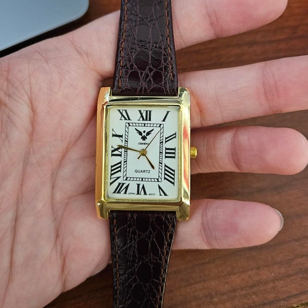 Oleg Cassini Men's Gold Watch Oval Dial With Index Hour Marker's on a ...