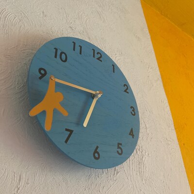 Fuchsia Hanging Man Wall Clock - Etsy