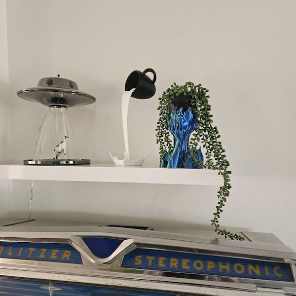 Gravity-defying Liquid Sculpture, Frozen in Time, a Cup Pouring Liquid ...