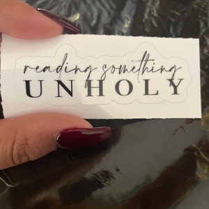 Reading Something Unholy Book Inspired Sticker, Laptop Stickers, Funny ...