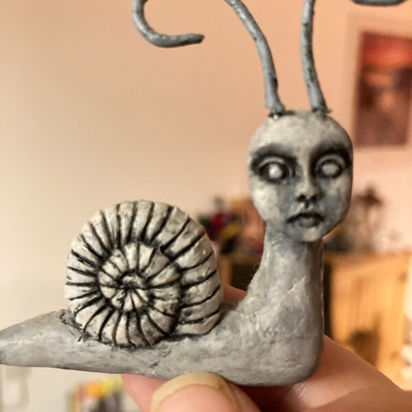 Miniature Sculpture and Textile Assemblage Inside an Illustrated ...