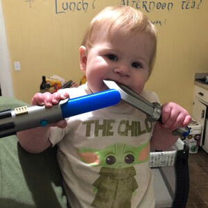 Darth Vader's lightsaber rattle | Etsy