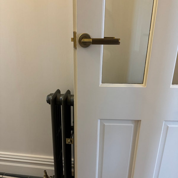 Lines Lever on Round Rose Door Handle. Pair of Door Handles on ...
