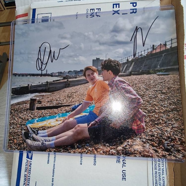 Joe Locke and Kit Connor Signed Heartstopper Sitting on Beach LGBTQ ...