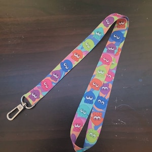 ENA Merch Bundle W/ Charms, Buttons, and a Lanyard - Etsy