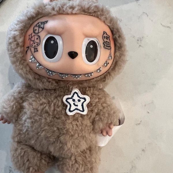 Custom Face-tatted Labubu | Tattoos, Iced-out Grills, Painted Eyes ...