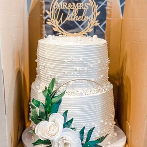 Hoop Centerpiece With Tiered Platform Stand. Metal Hoop Attached to a 3 ...