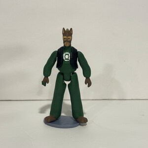 Batcave Trophy Room With Robin Memorial, Giant Penny, Penguin, and ...