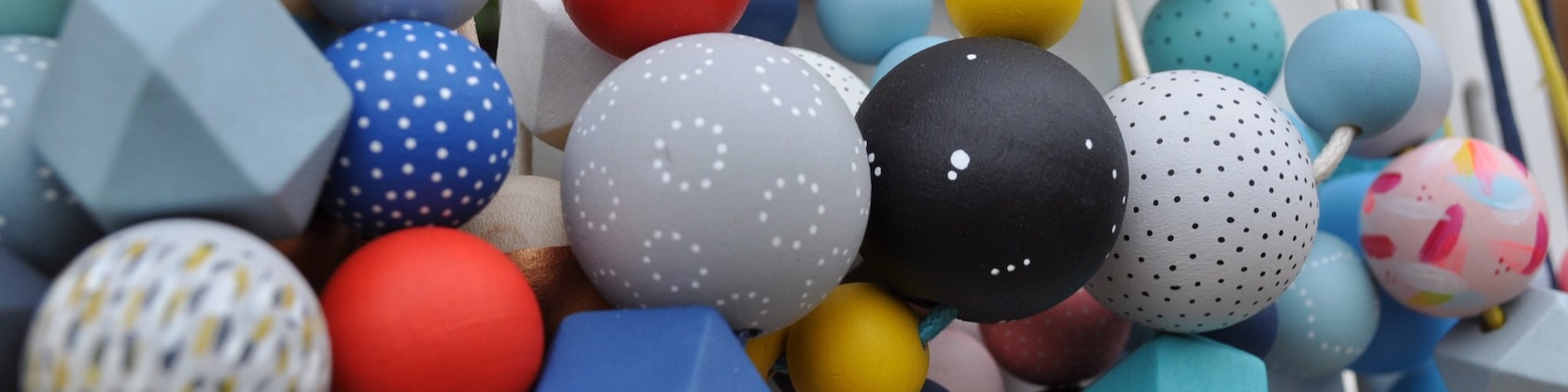 Colourful wooden bead jewellery made in Cornwall. by SeaPinkStudio