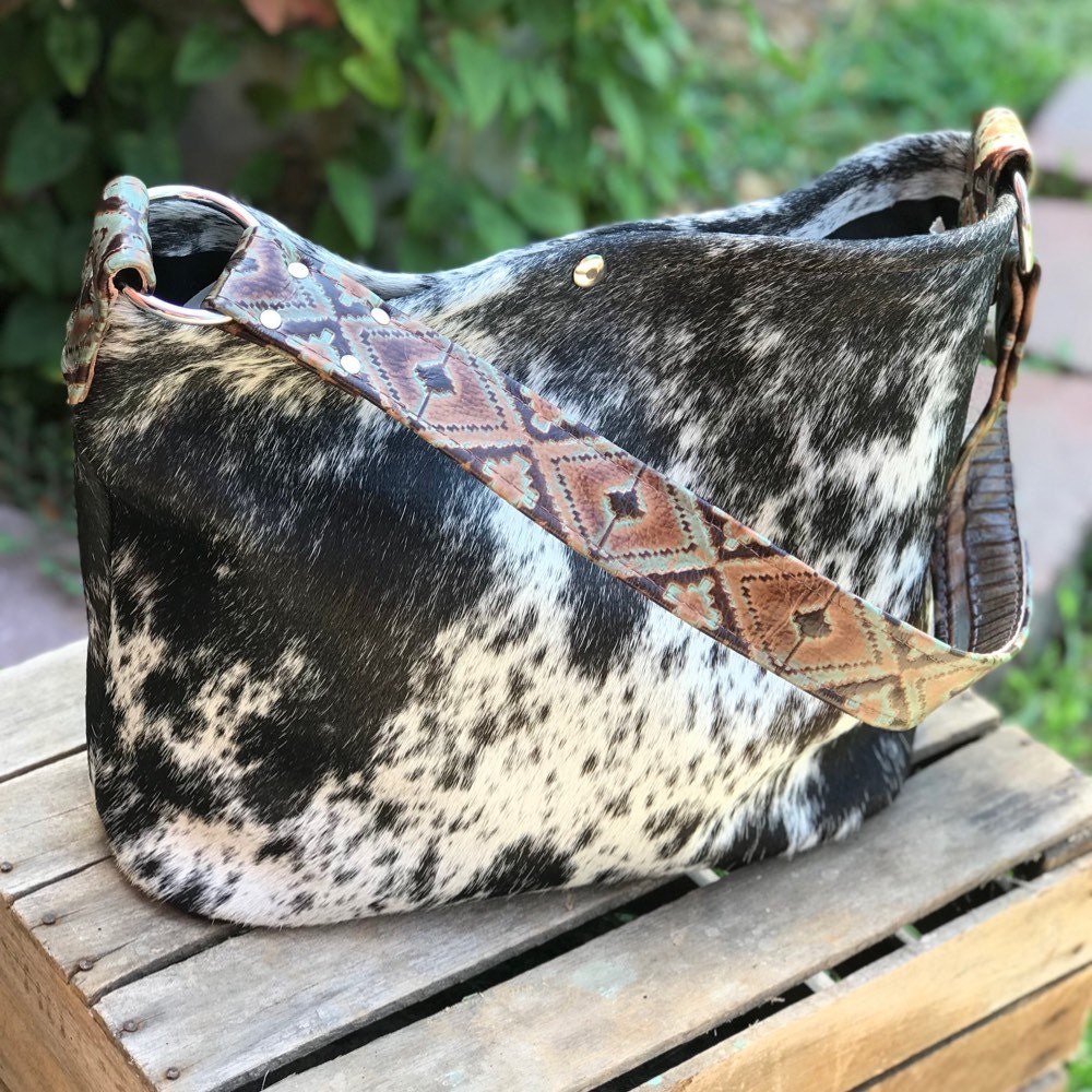 We design and sew genuine cowhide bags by WildGooseBags on Etsy