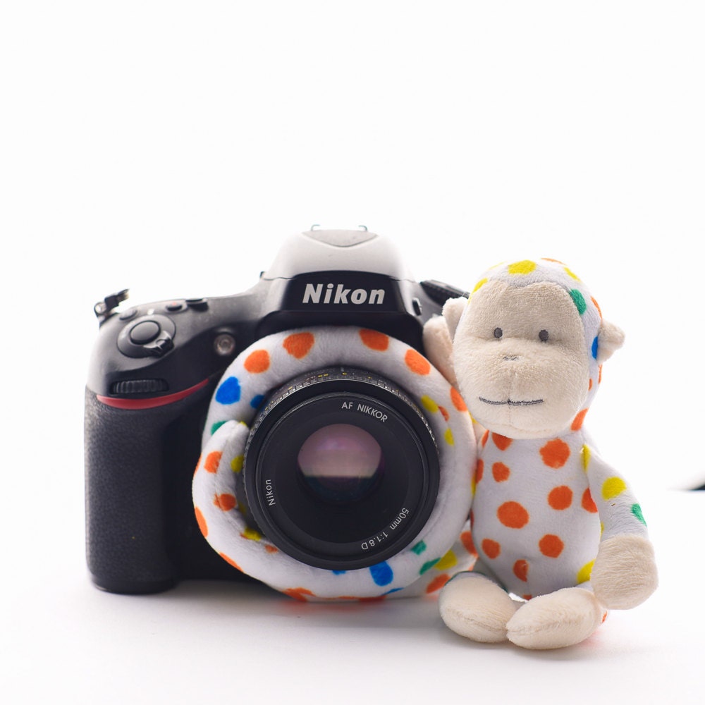 Phoxi Tog DSLR camera shutter lens buddy huggers by PhoxiTog