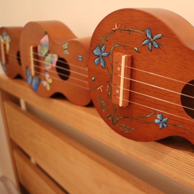Beautiful hand-painted ukuleles by HollyFrancesArt on Etsy