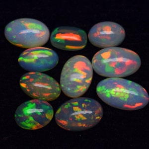 Top Quaility Galaxy Fire Ethiopian Opal Oval Shape 8.10 Carat Ethiopian Opal Cabochon Gemstone ...